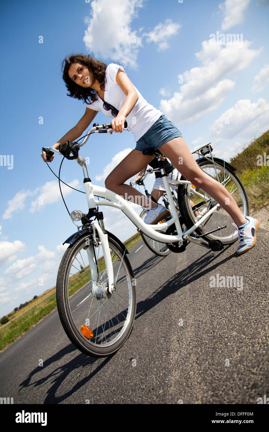 Girl riding her bike Stock Photo - Alamy