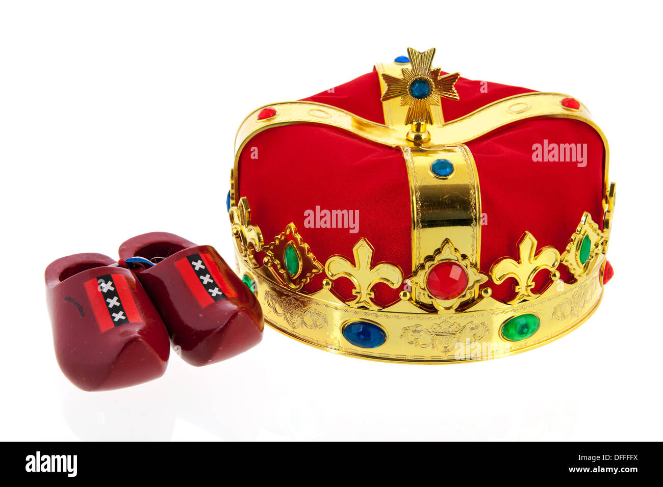 Dutch golden crown with wooden clogs from amsterdam isolated over white ...