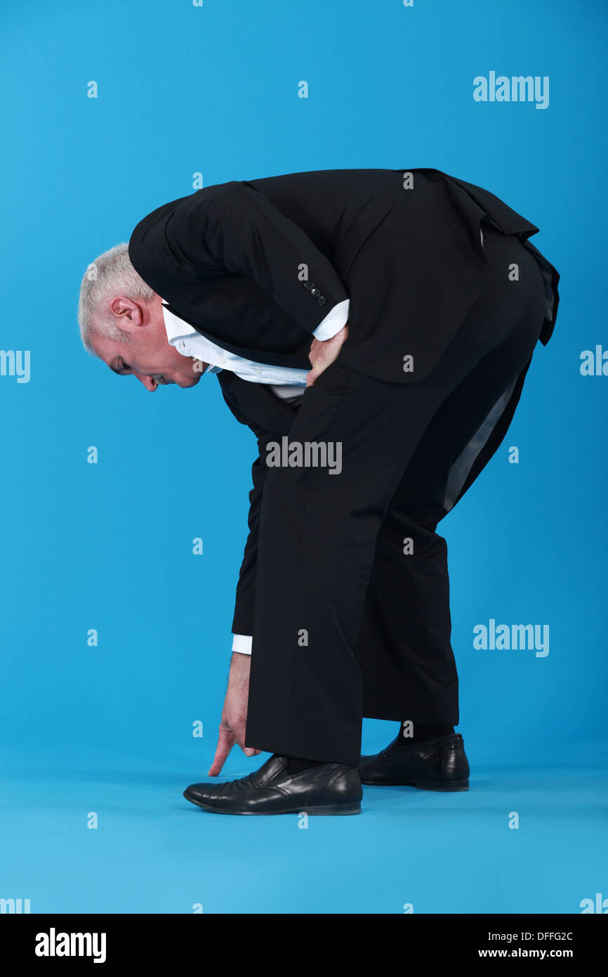 Bending over standing hi-res stock photography and images - Alamy