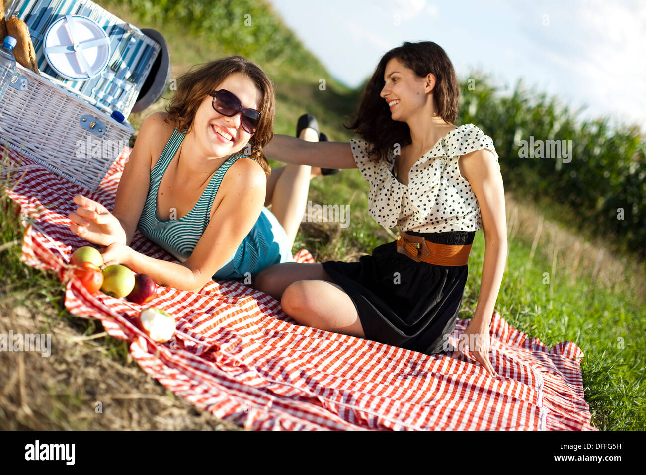 Girls on a picnic Stock Photo - Alamy