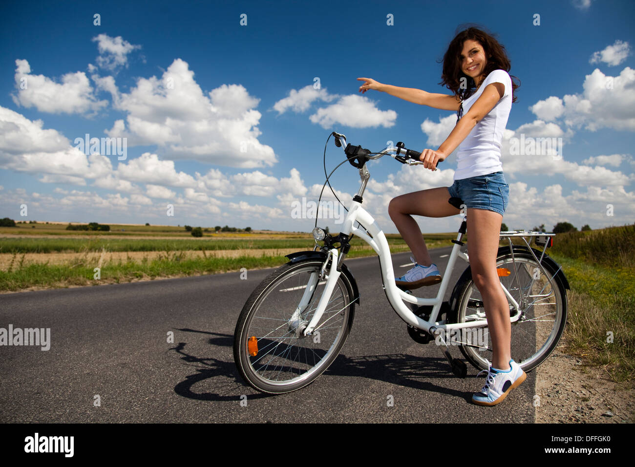 Girl riding her bike Stock Photo - Alamy