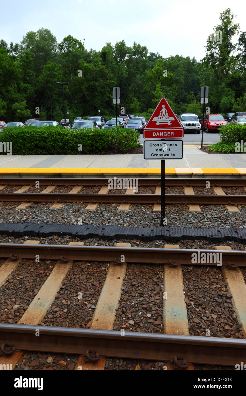 Cross tracks only at crosswalks sign next to pedestrian crossing, Falls ...