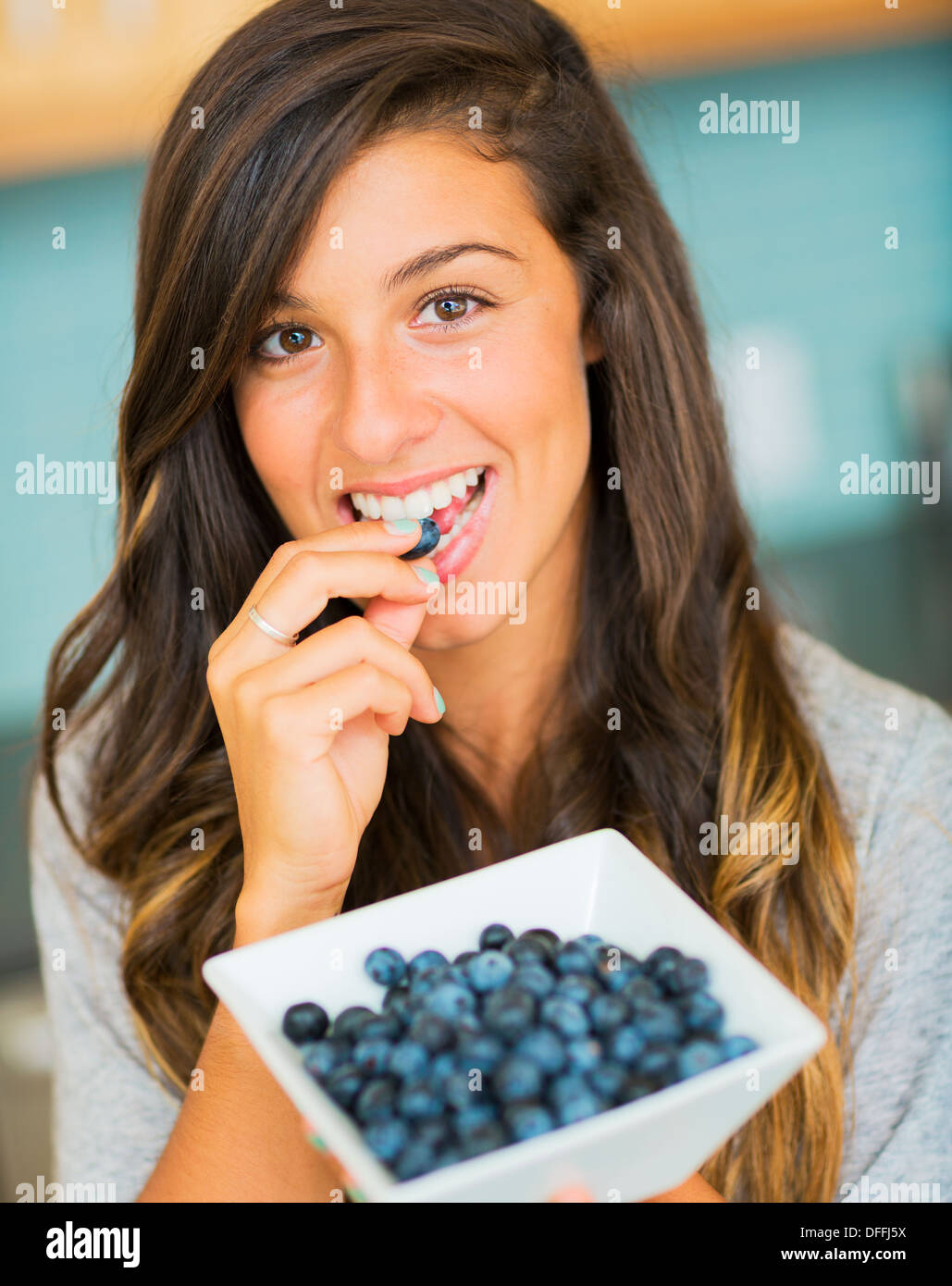 Woman blueberries portrait eating hi-res stock photography and images ...