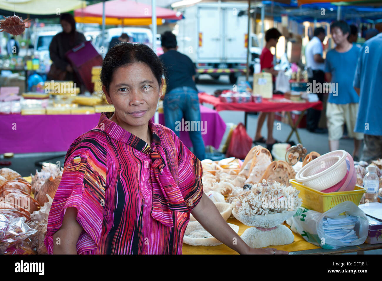 Asian woman selling shells, Sabah, Malaysia Stock Photo - Alamy