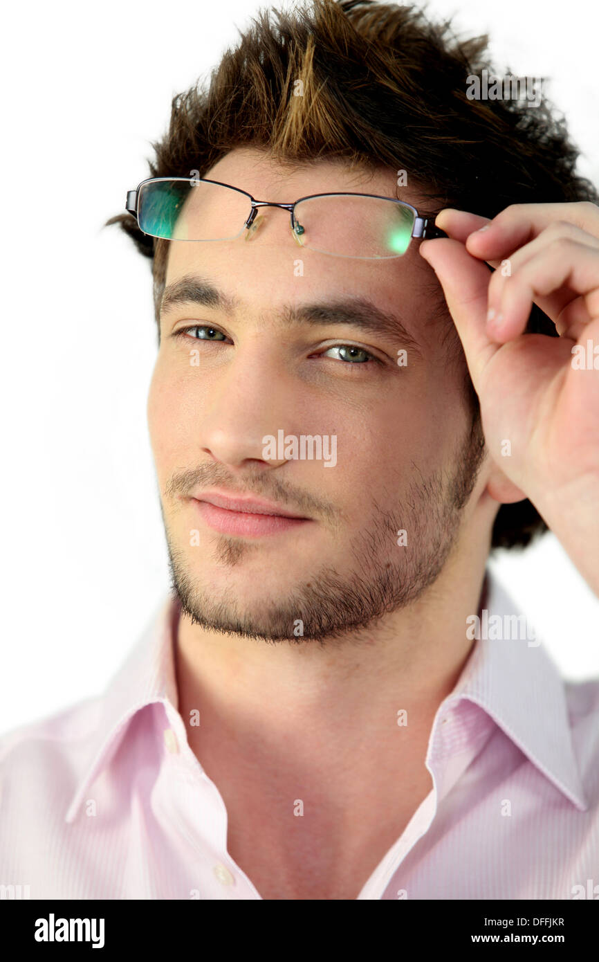Man raising his glasses Stock Photo - Alamy