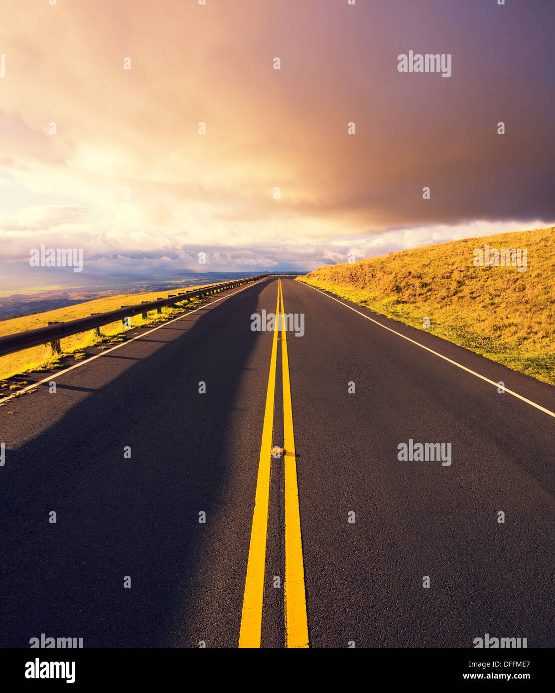 Sunset Road, Mountain Road into Dramatic Sunset Stock Photo - Alamy