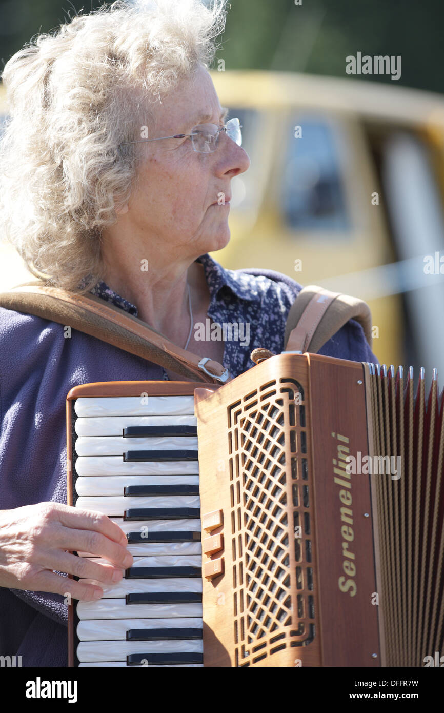 Mature musician playing accordion hi-res stock photography and images ...