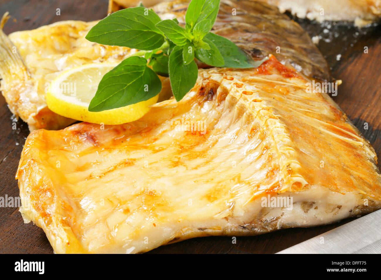 Oven baked carp fillet with lemon and dill Stock Photo - Alamy