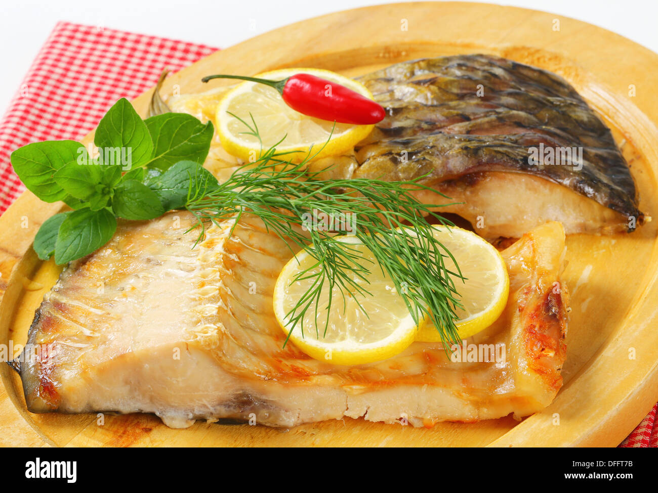 Oven baked carp fillet with lemon and dill Stock Photo - Alamy