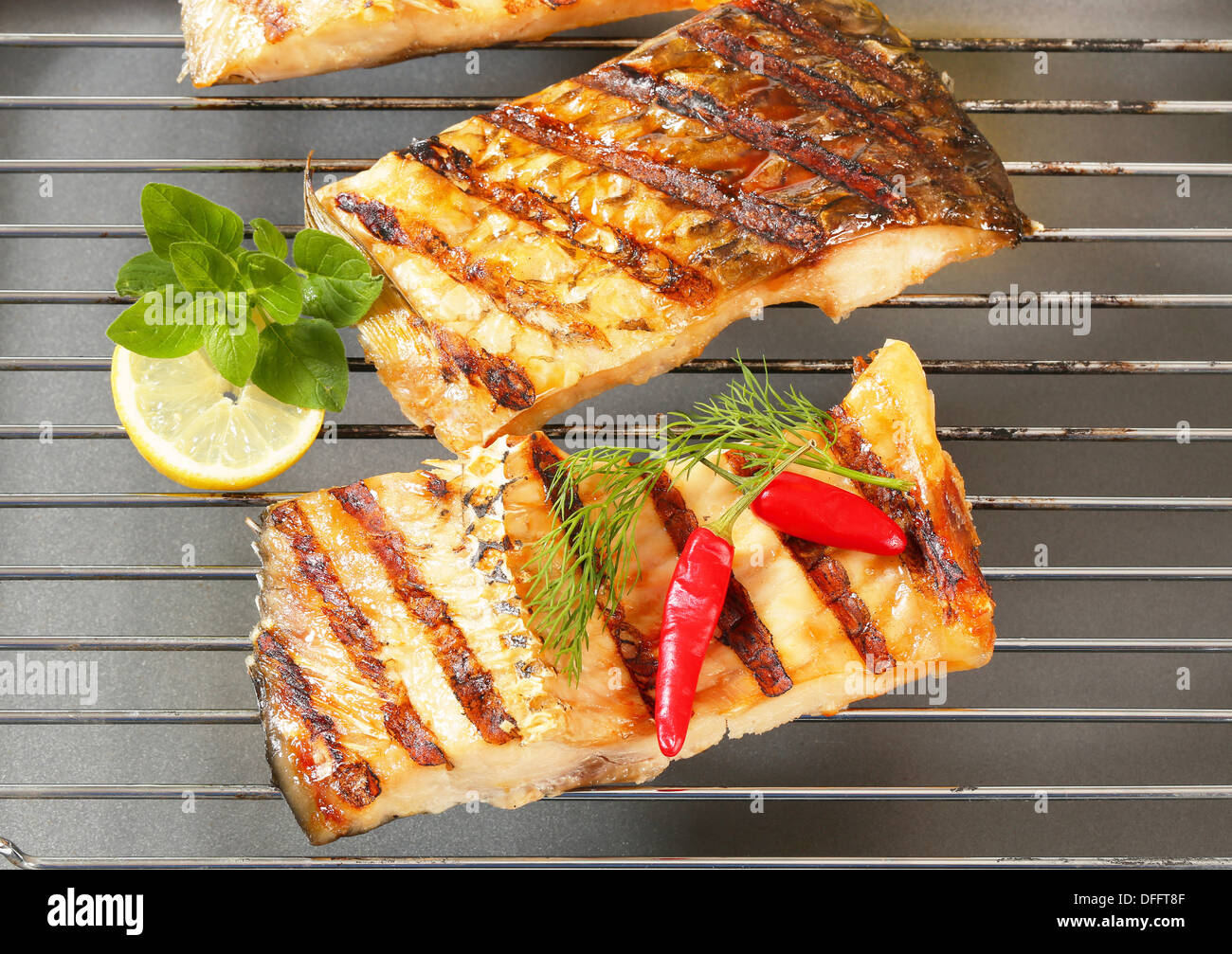 Grilled carp fillets on a grid Stock Photo - Alamy
