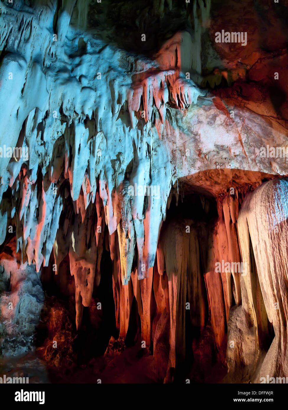 Stalactite wall illuminated with color light Stock Photo - Alamy