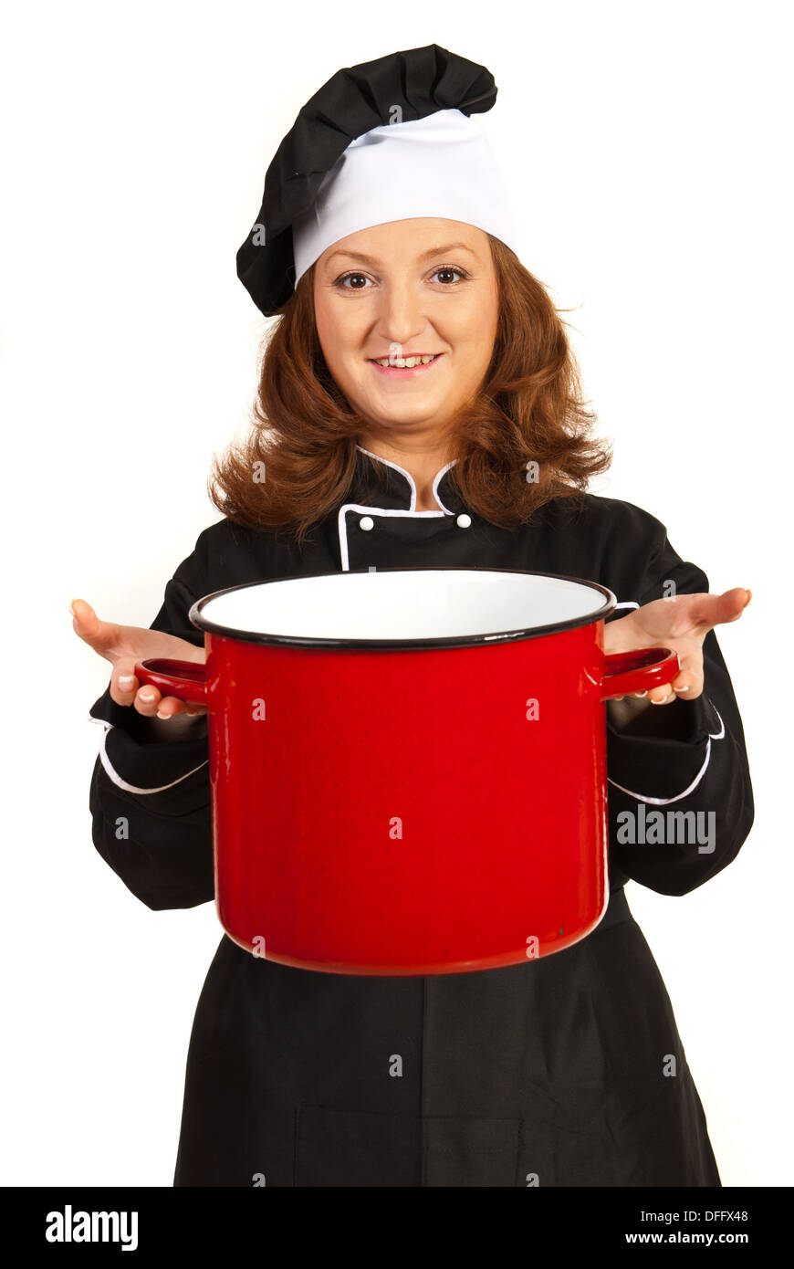 Chef woman holding big red pot in front of camera isolated on white ...