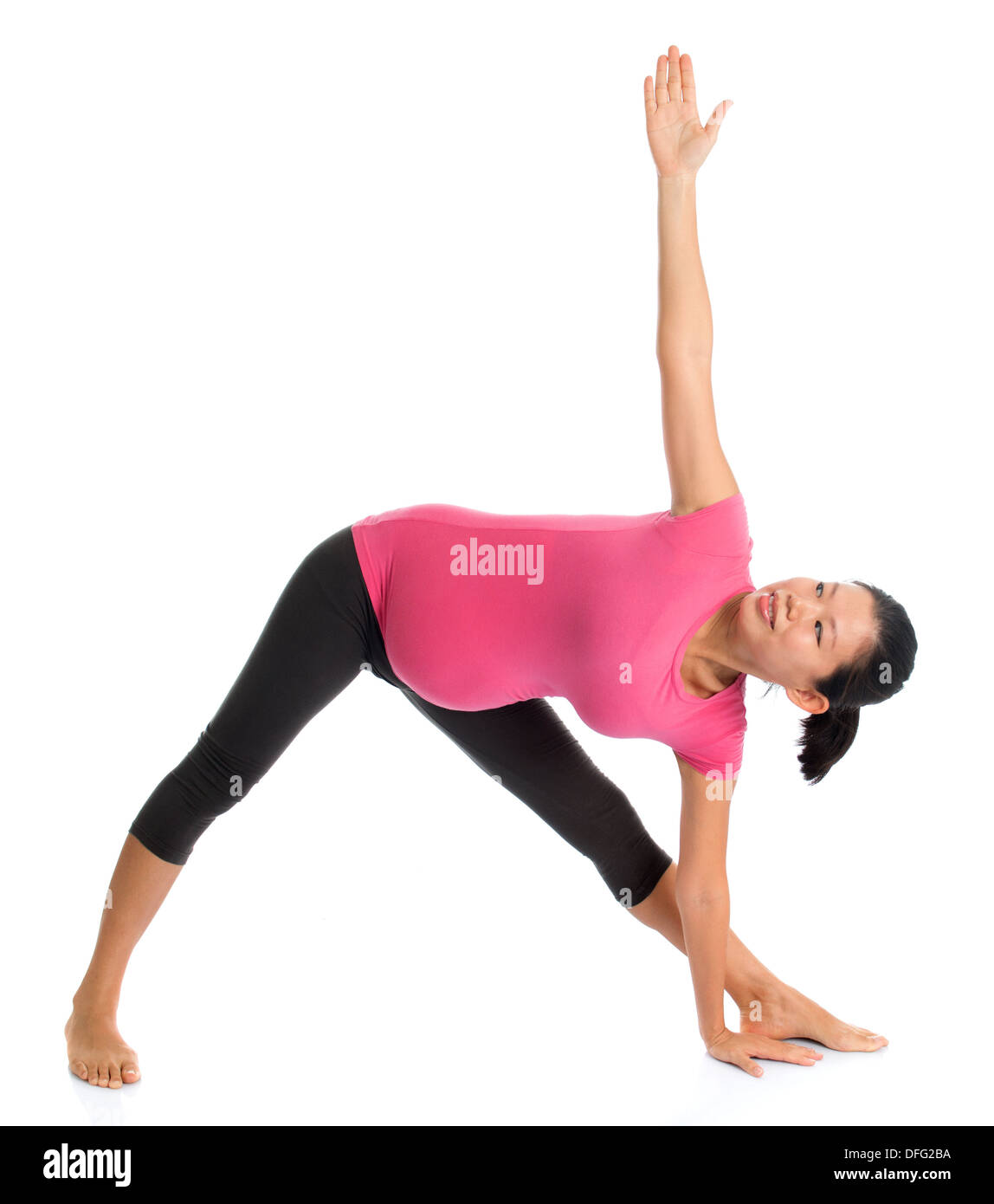 Pregnancy yoga class. Full length healthy Asian pregnant woman doing ...