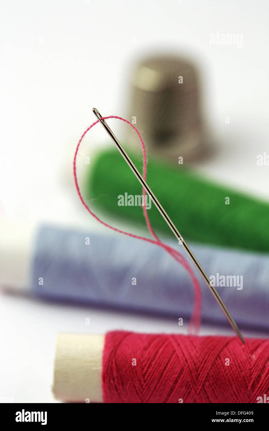 White thimble hi-res stock photography and images - Alamy