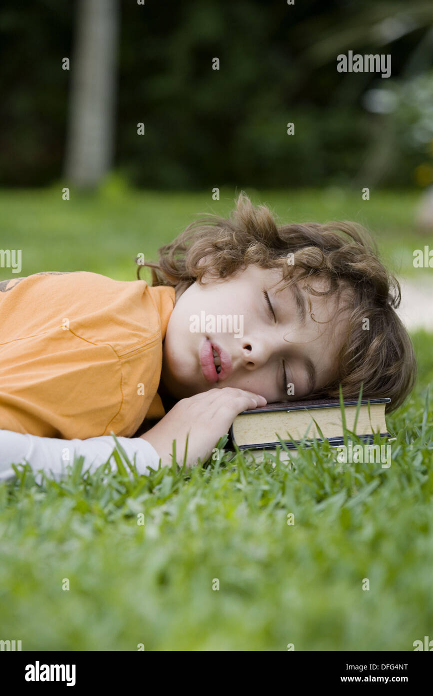 Boy Napping On Grass High Resolution Stock Photography and Images - Alamy