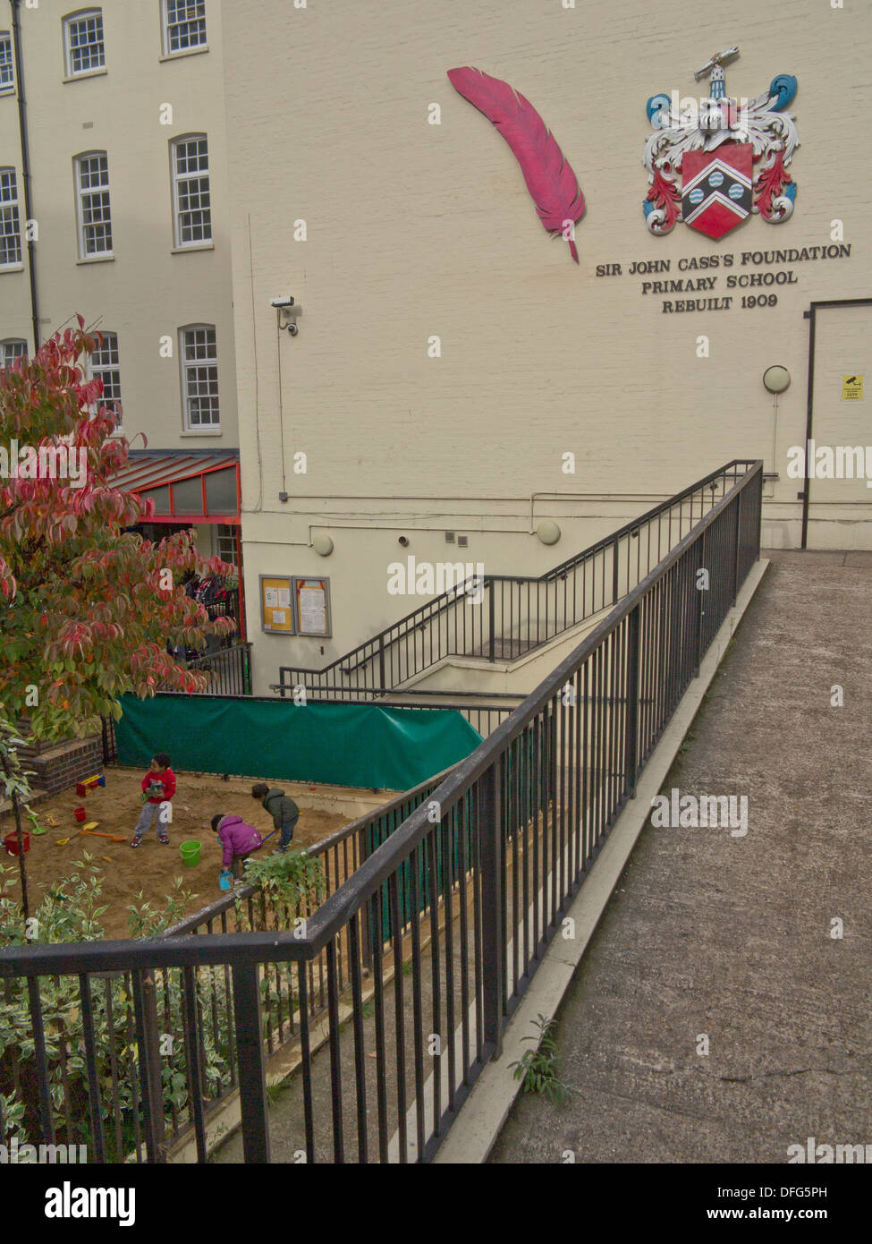 Children play in the garden of the Sir John Cass Foundation school in ...