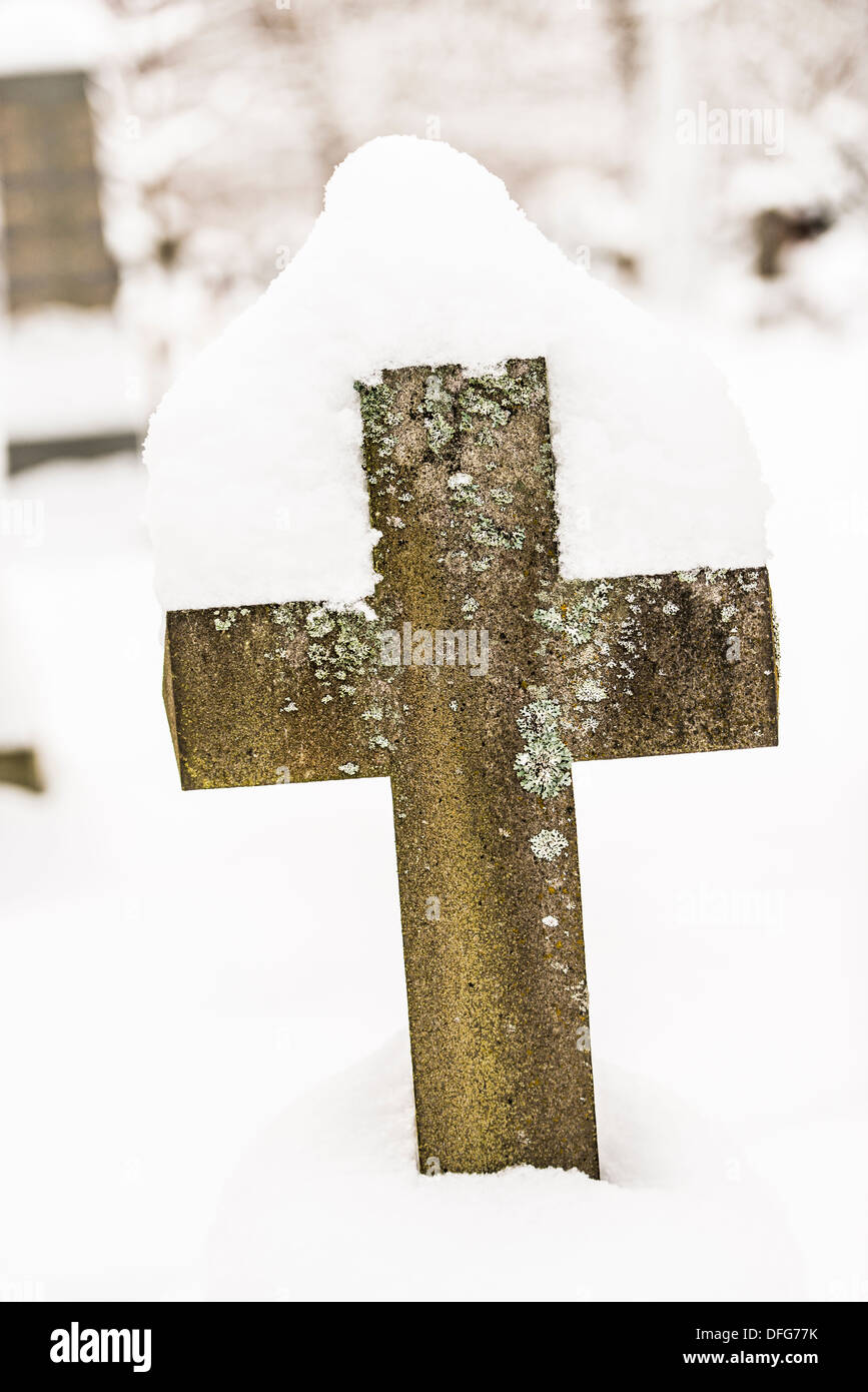 Snow covered tombstone in graveyard. Stockholm, Sweden Stock Photo - Alamy