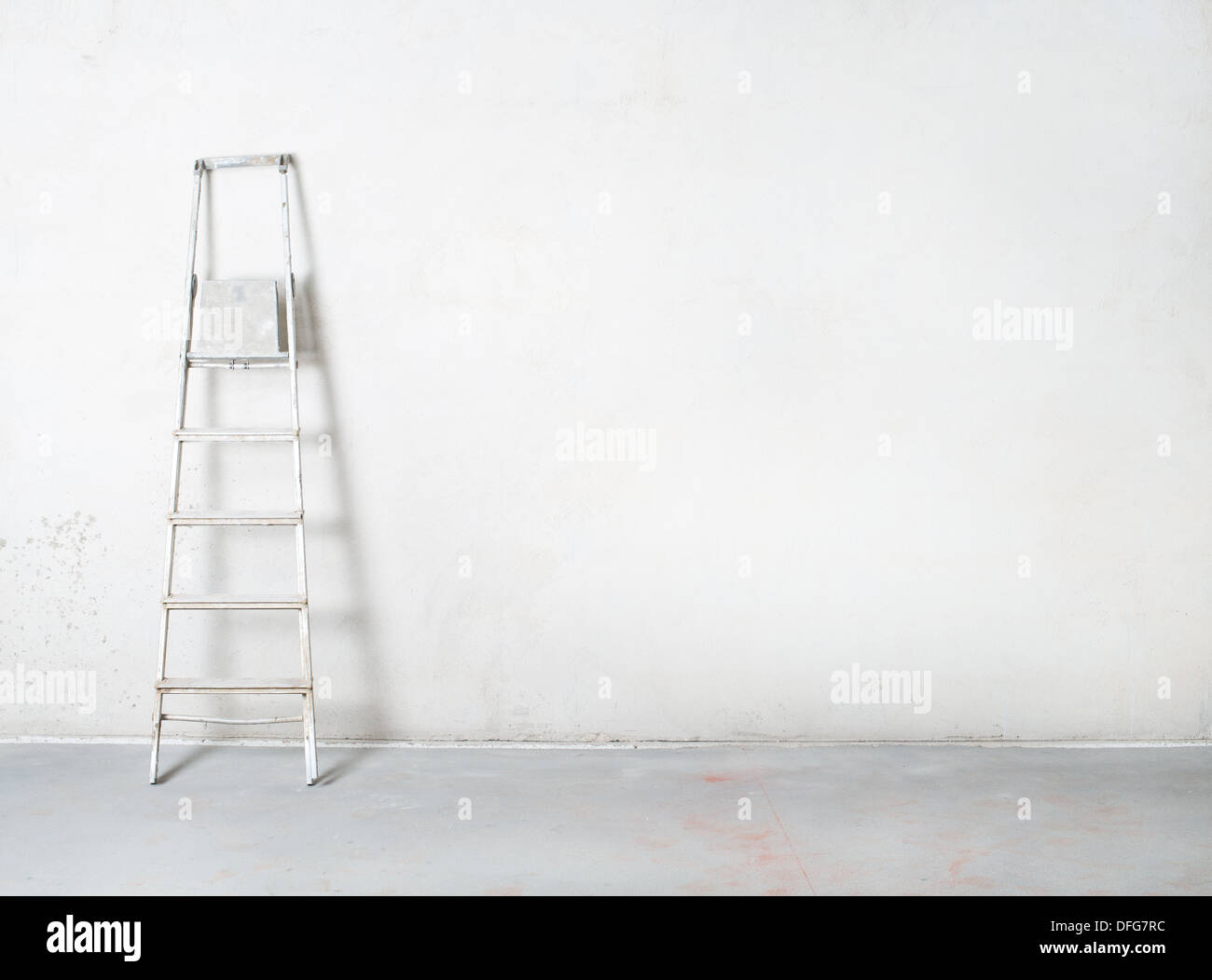 Ladder on concrete wall, construction site Stock Photo - Alamy