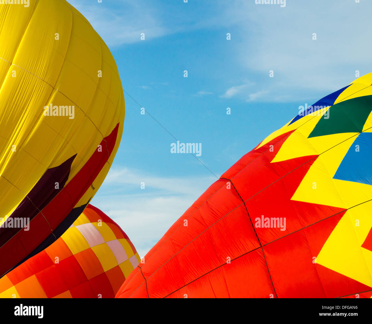 Three colorfull hot air balloons are being inflated for flight Stock ...
