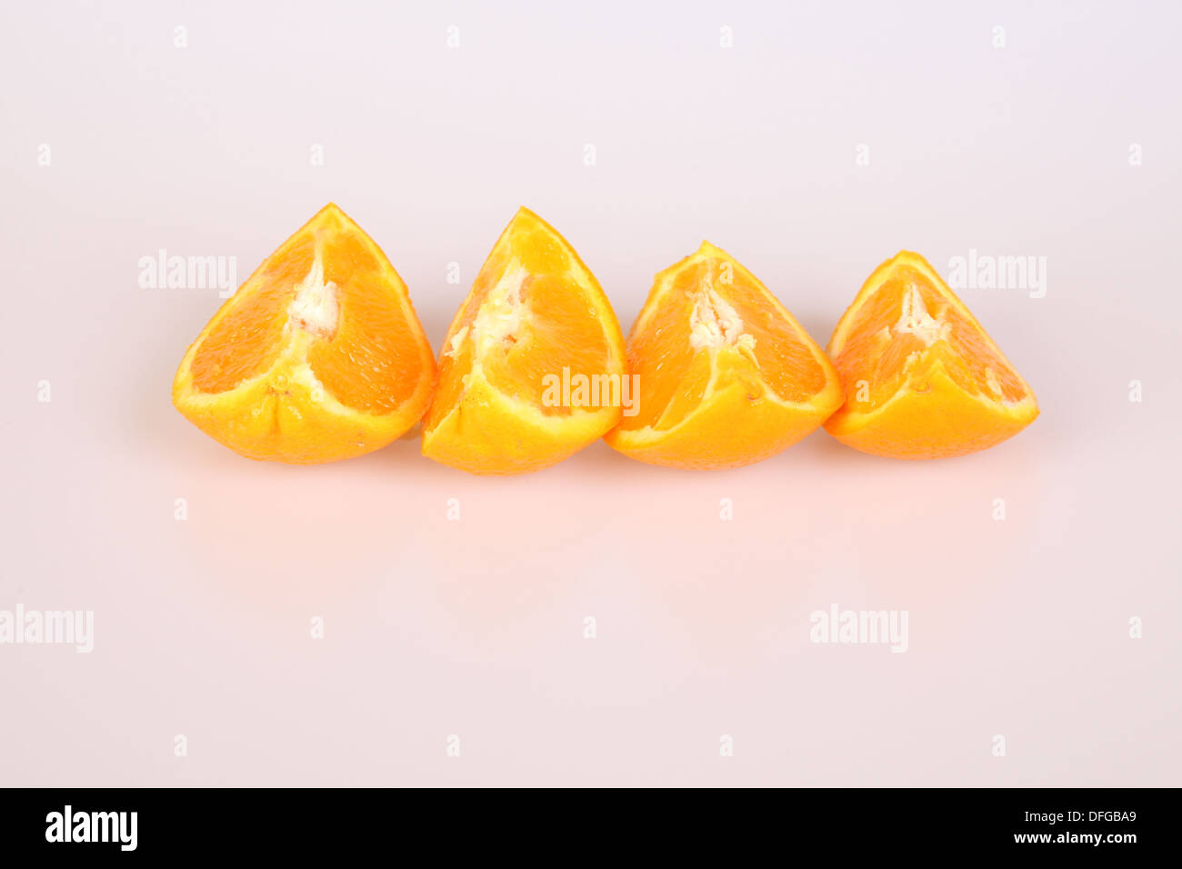 Quarters of orange hi-res stock photography and images - Alamy