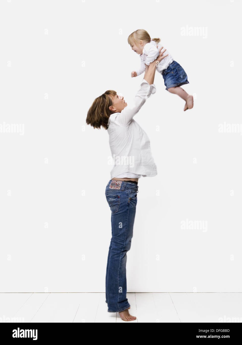 Girl raising foot High Resolution Stock Photography and Images - Alamy