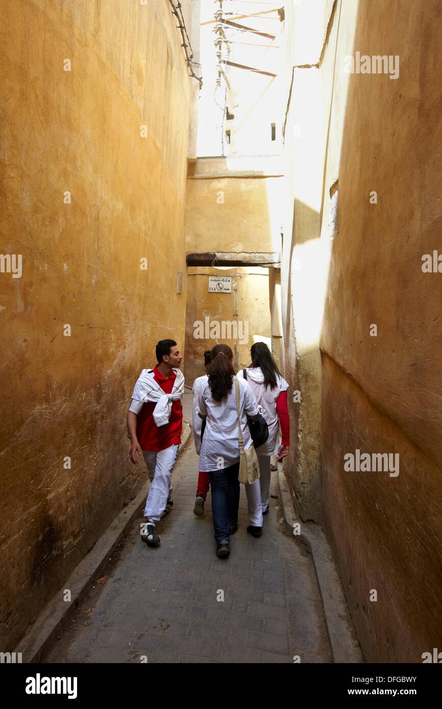 Man walking fez fes medina hi-res stock photography and images - Alamy