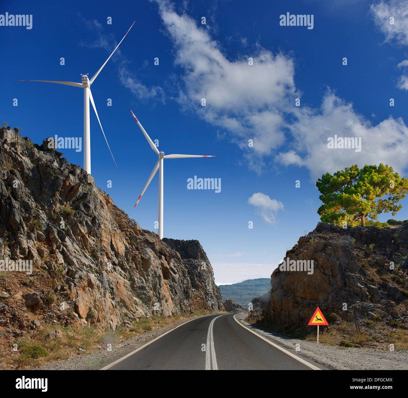 Mountain road with wind turbines Stock Photo - Alamy