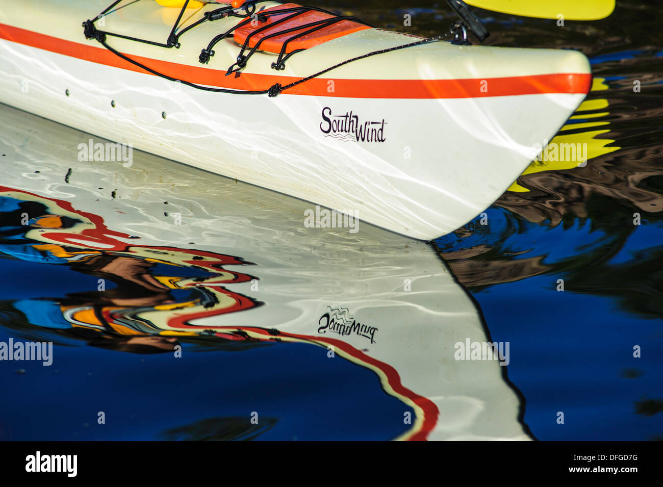 Bow of kayak reflecting in water Stock Photo - Alamy