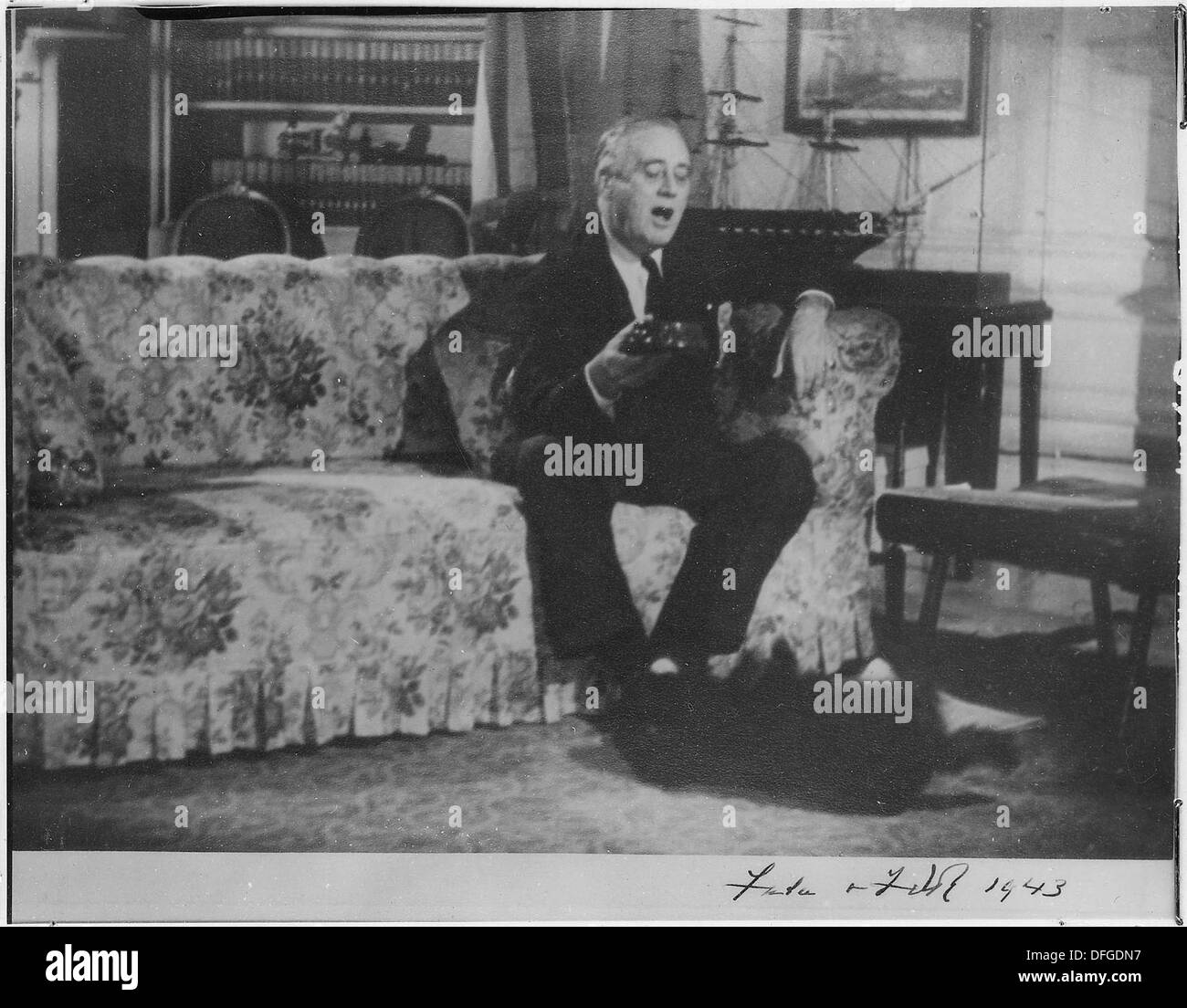 This iconic photograph shows President Franklin D. Roosevelt with his ...