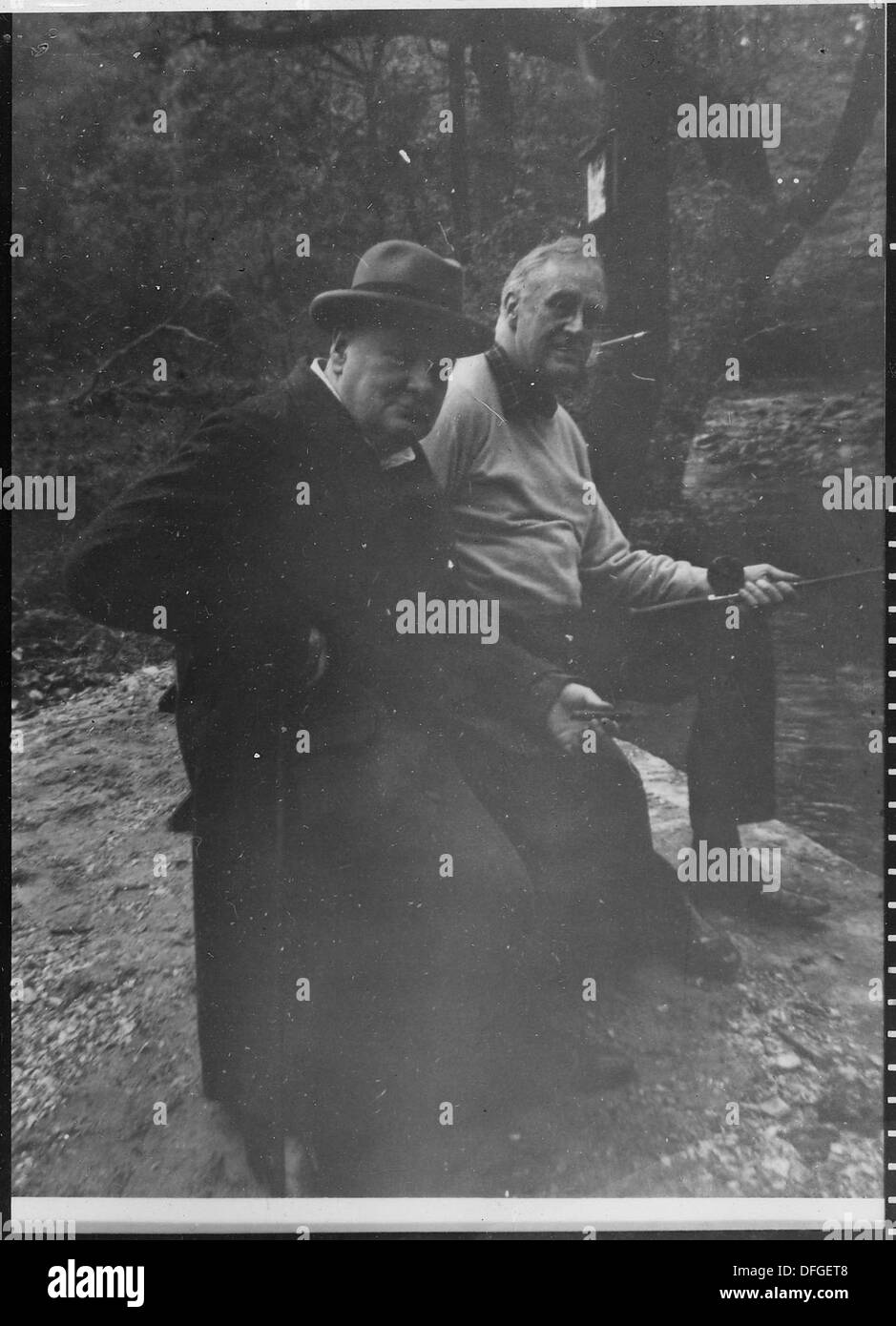 The photograph shows Franklin D. Roosevelt and Winston Churchill at ...