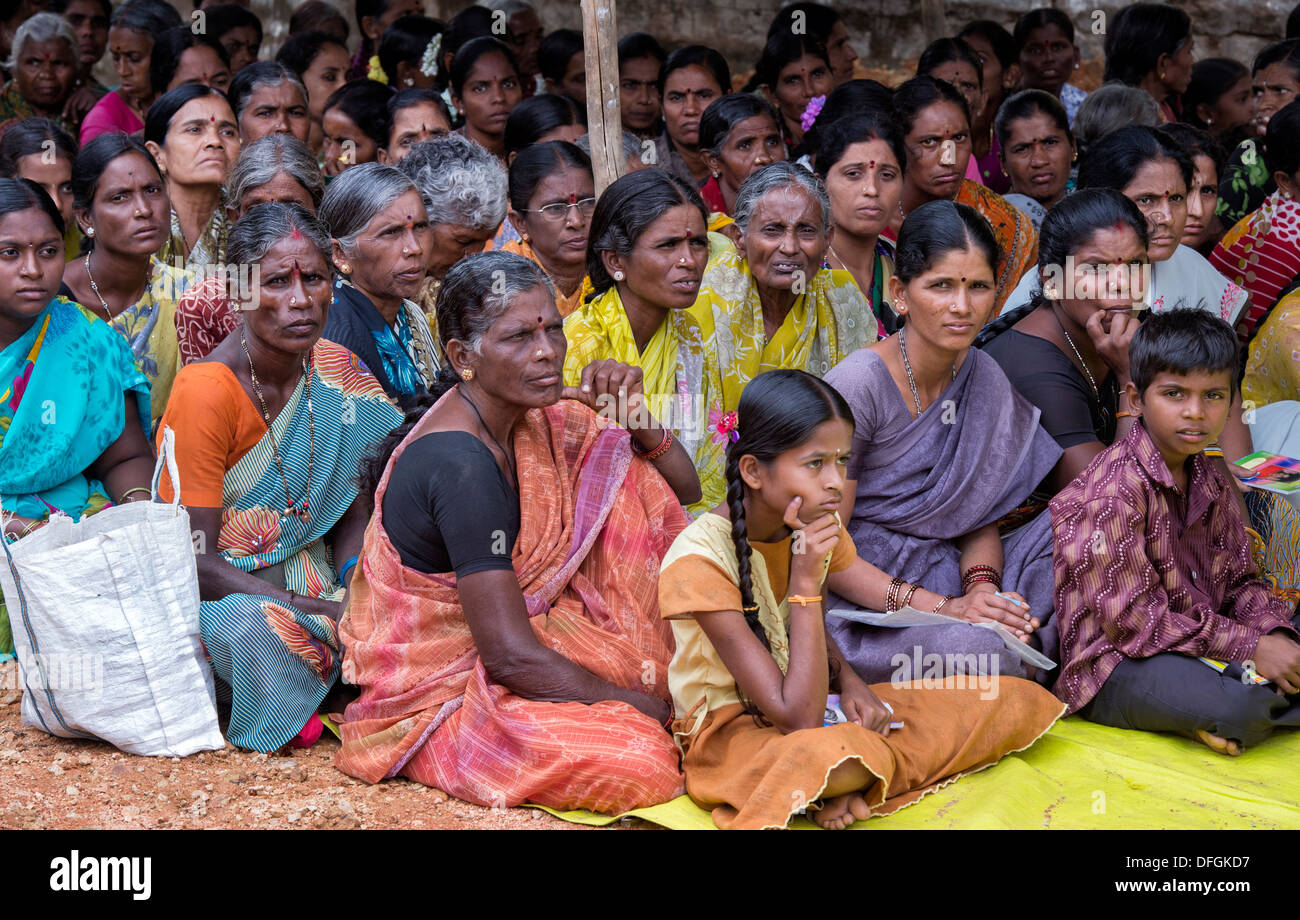Rural Indian women and children in waiting area at Sri Sathya Sai Baba ...
