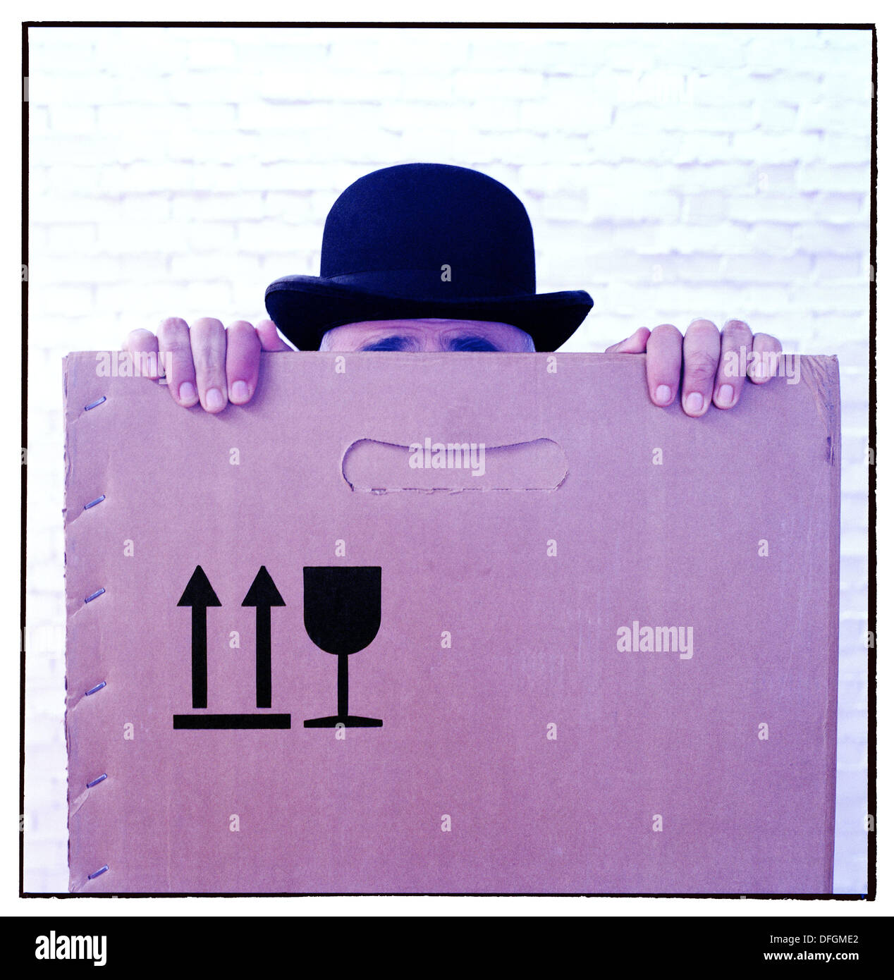 Man hiding inside a cardboard box Stock Photo - Alamy