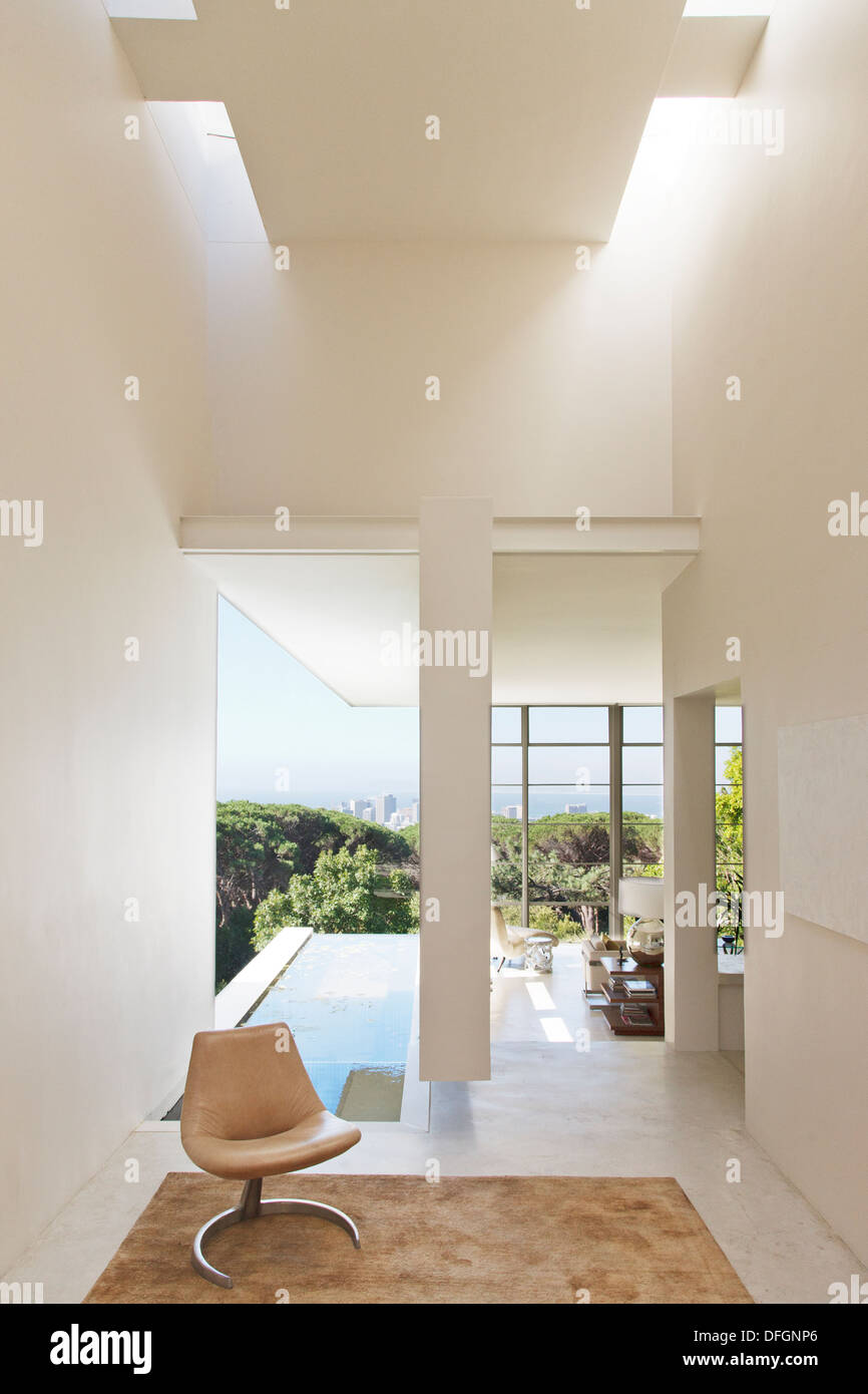 Modern house overlooking city in distance Stock Photo - Alamy