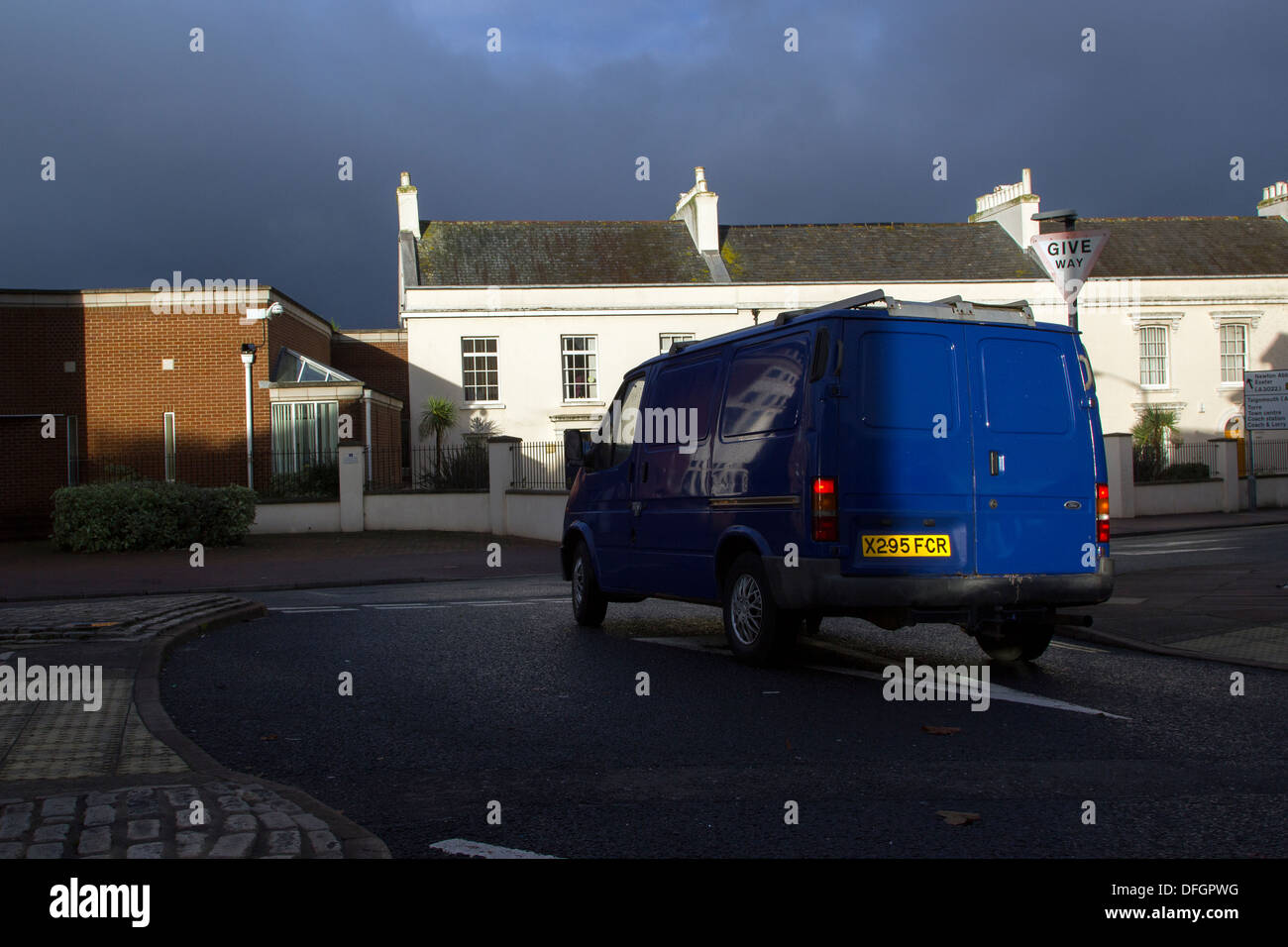 victorian terrace,storm,blue van Stock Photo - Alamy