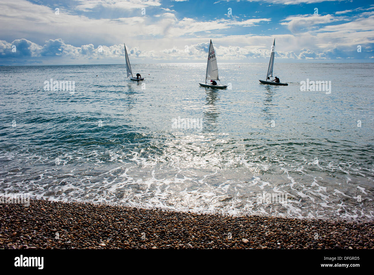 Sailing boats on the sea at Beer Devon England UK Stock Photo - Alamy