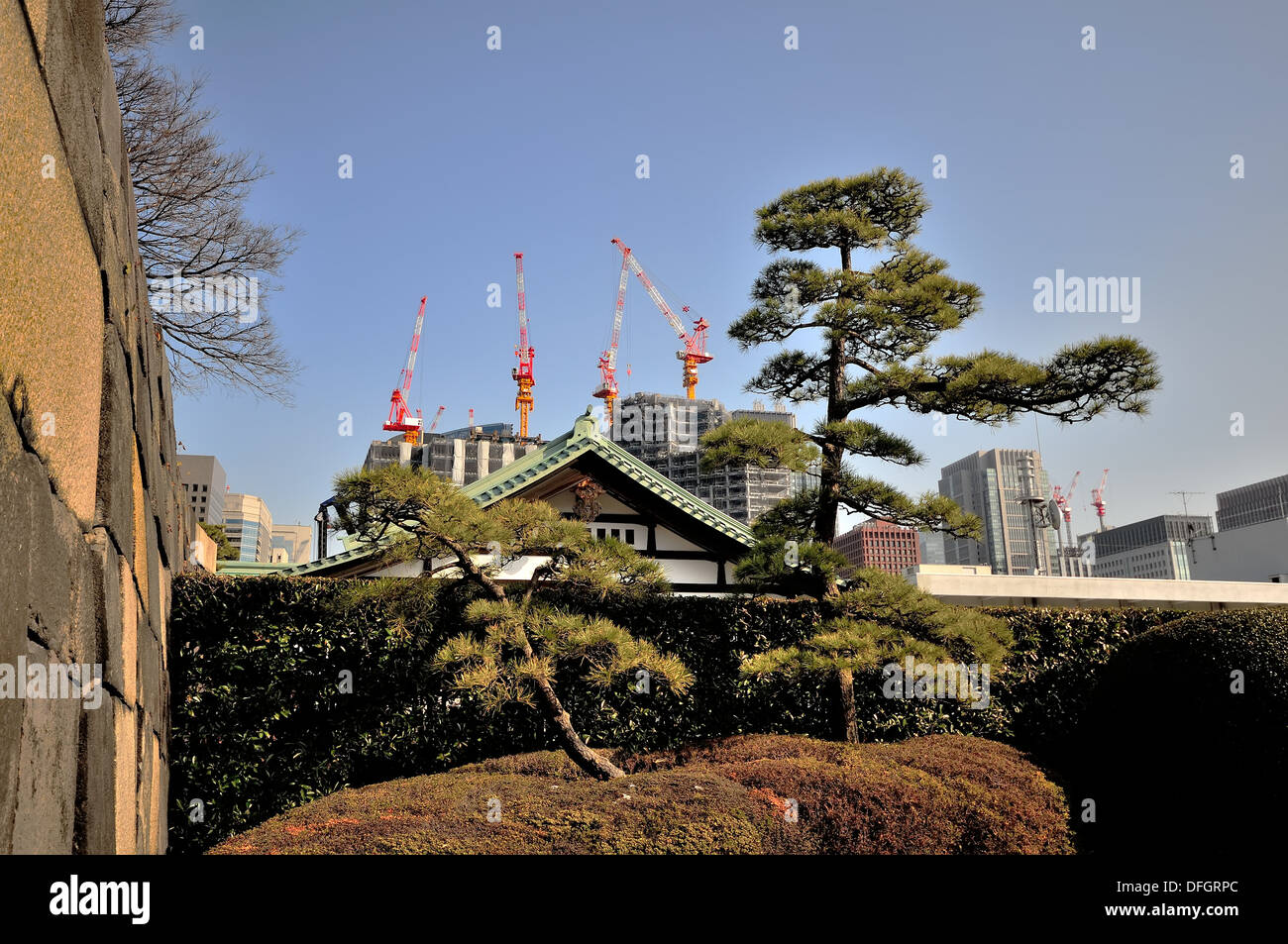 Construction of office buildings viewed from the garden of the Imperial ...