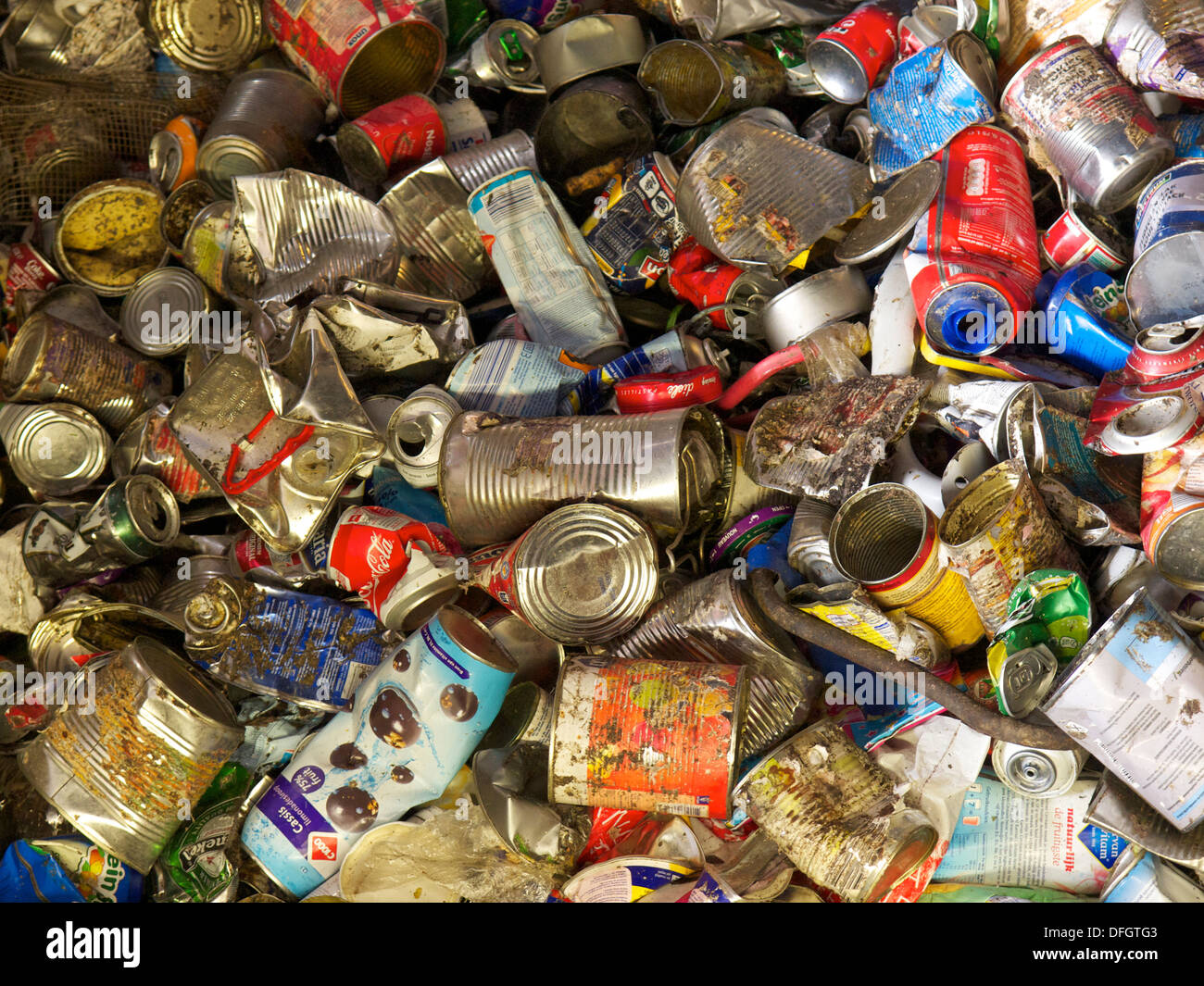 Metal items separated from household waste in recycling plant, ready to ...