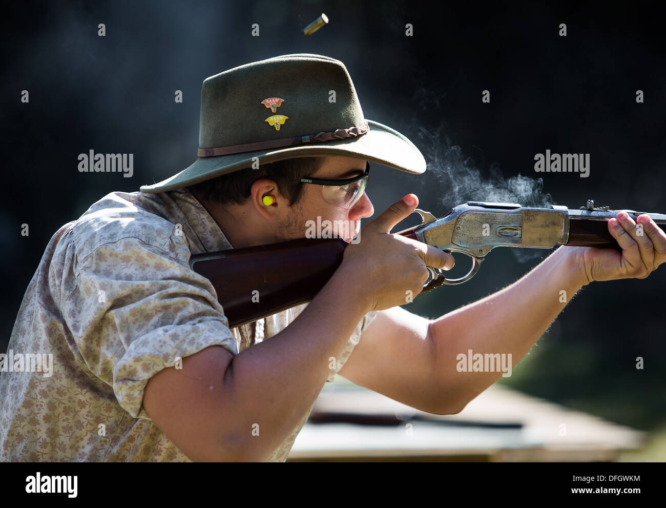 Cowboy at single action gun competition Stock Photo - Alamy
