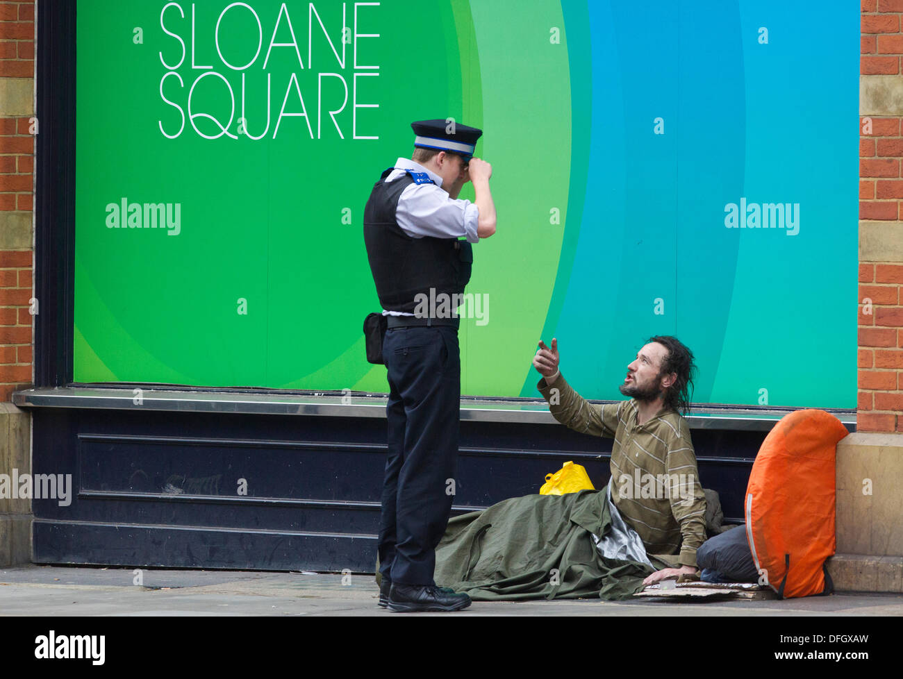 Homeless man police officer hi-res stock photography and images - Alamy