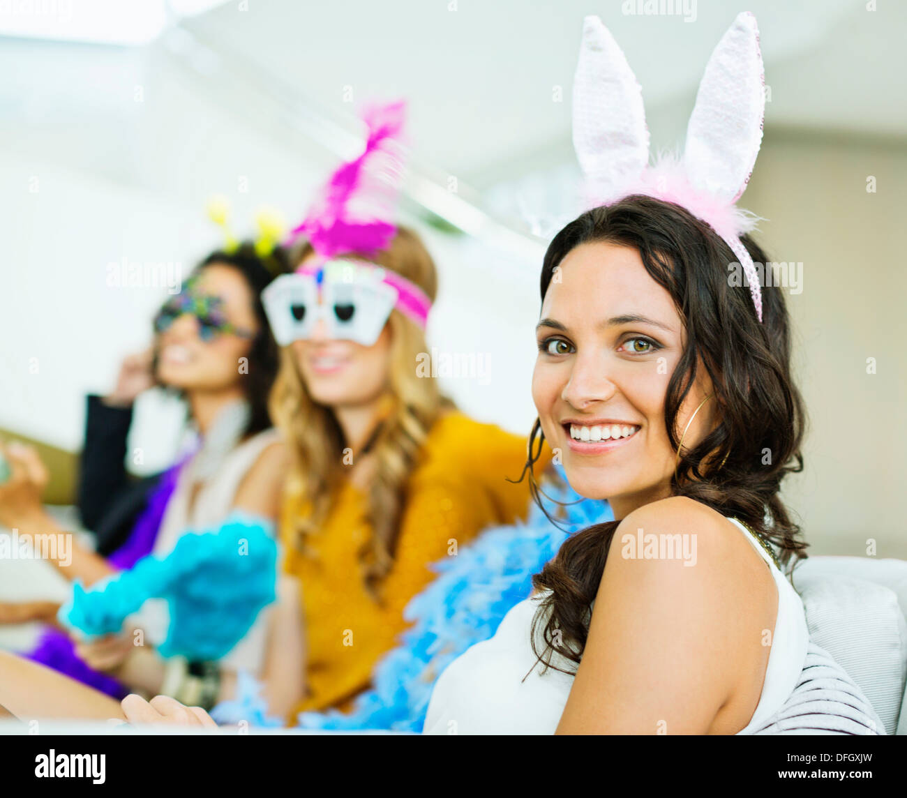 Woman wearing bunny ears at party Stock Photo - Alamy