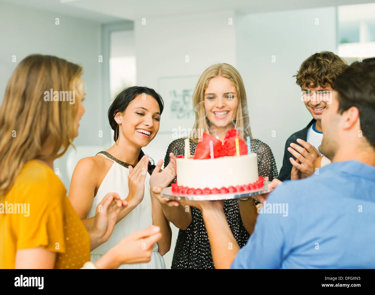 Woman clapping indoor party hi-res stock photography and images - Alamy