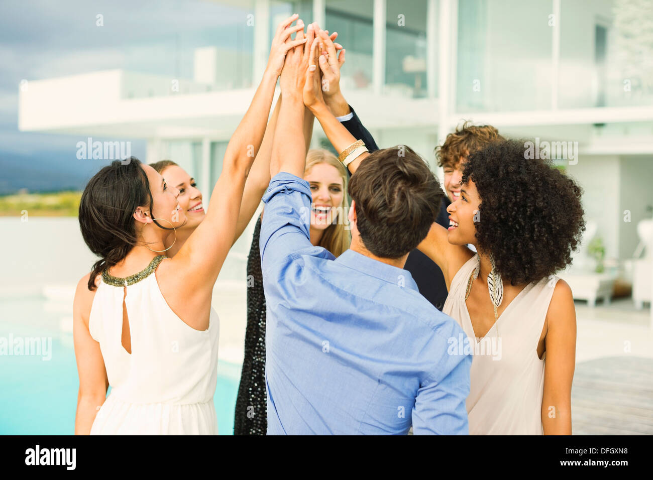 Female friends high fiving hi-res stock photography and images - Alamy