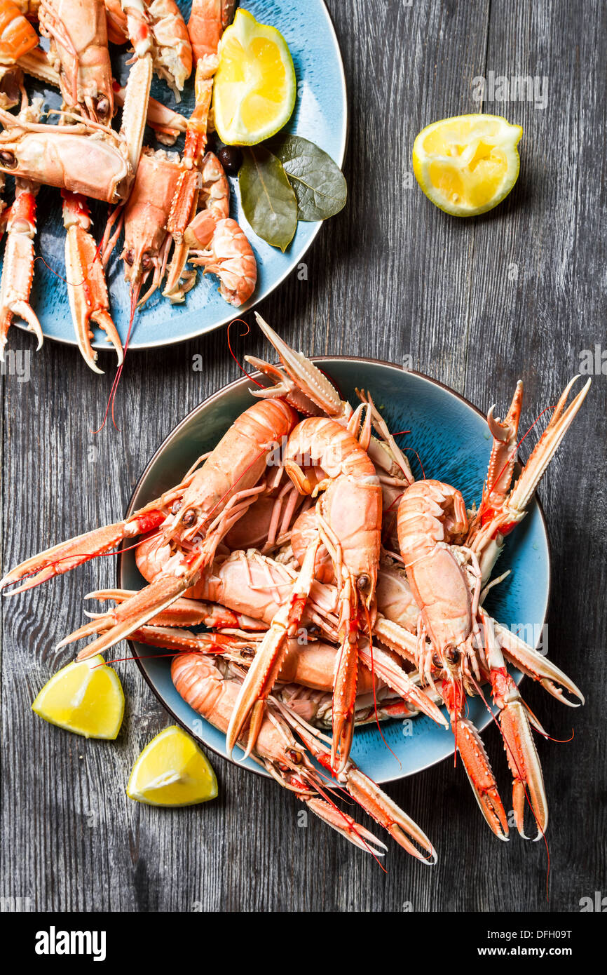 Freshly cooked scampi in a blue bowl Stock Photo - Alamy