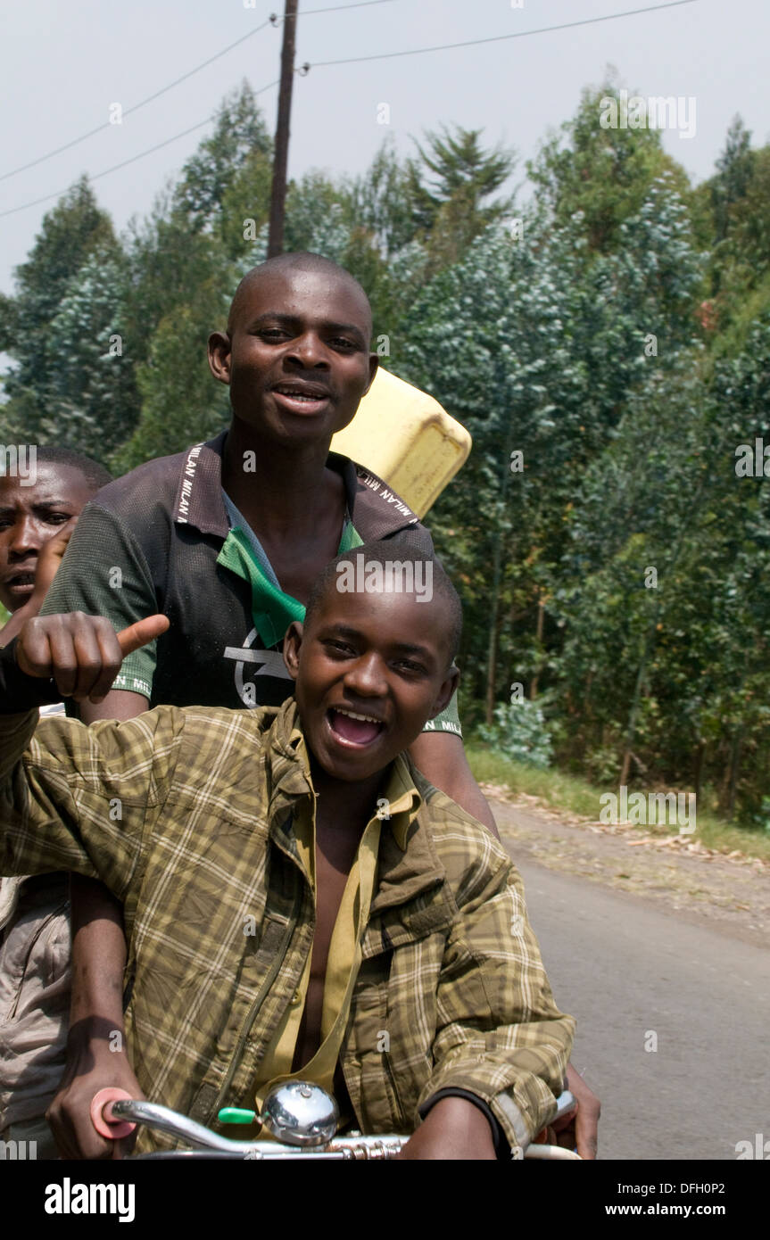 Rwandan young adults on cycle Lake Burera Northern Rwanda Central ...