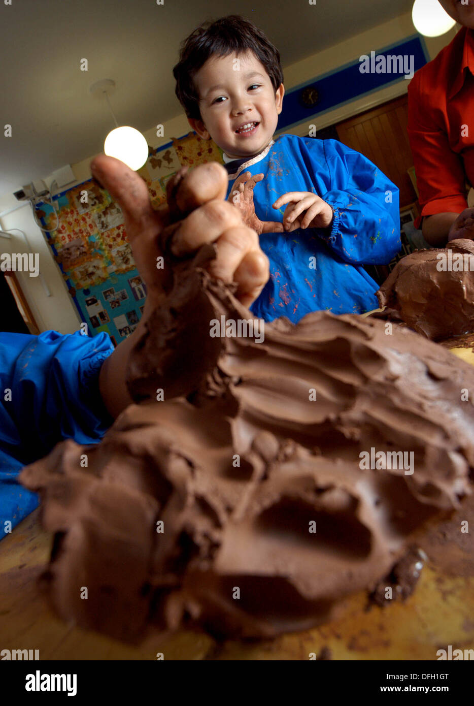 kids playing with clay at nursery Stock Photo - Alamy