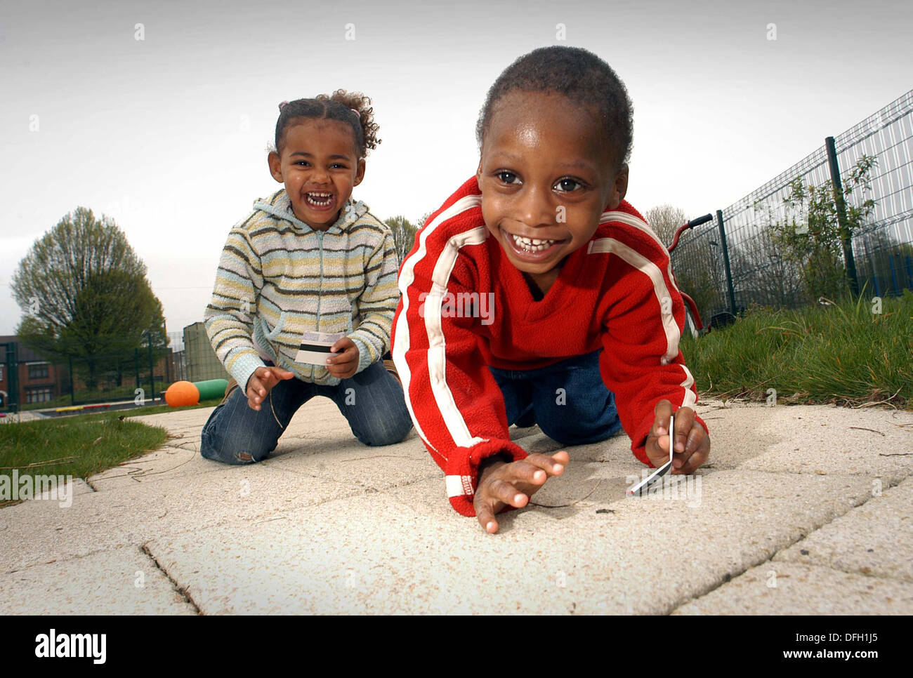 children playing at nursery school Stock Photo - Alamy