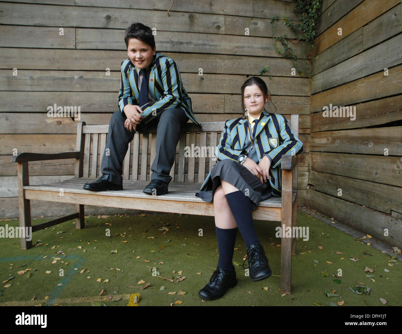 Relaxed portrait of pupils in school uniform hi-res stock photography ...