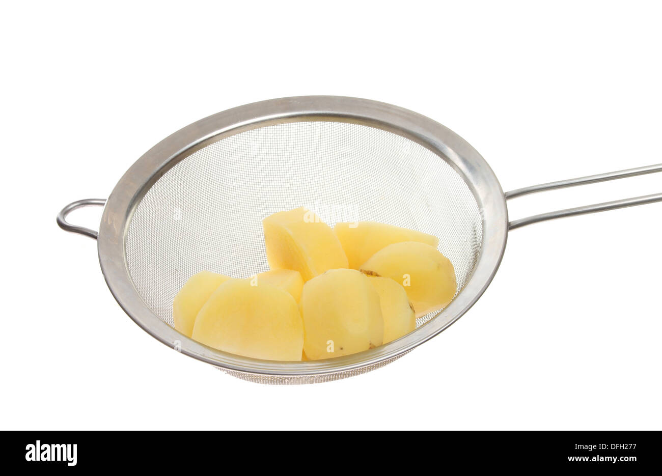 Boiled potatoes in a sieve isolated against white Stock Photo - Alamy