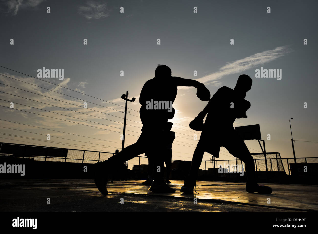 Peruvian youths workout at a sparring session at the Boxeo VMT boxing ...