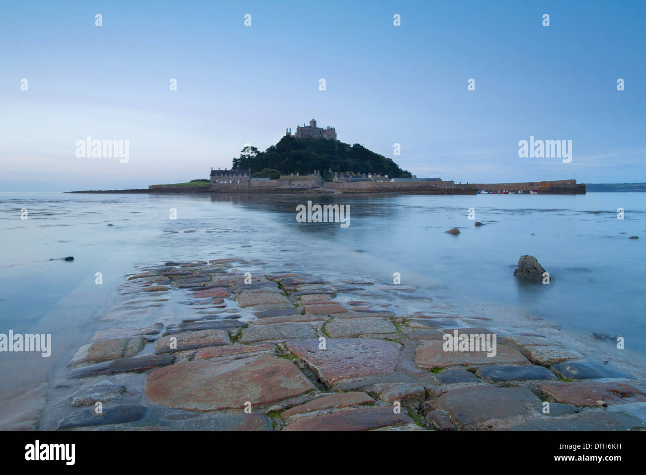 Incoming tide covering the causeway to St Michael's Mount, Cornwall ...